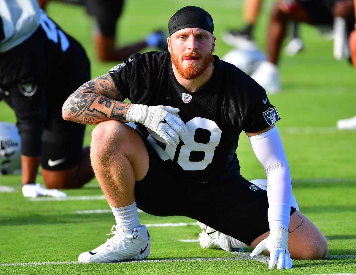 Las Vegas Raiders' Maxx Crosby took time from training camp practice to yell at the media tent